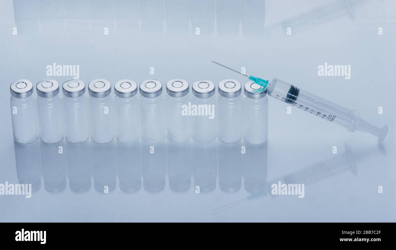 Medicine, Injection, vaccine and disposable syringe, drug concept ...