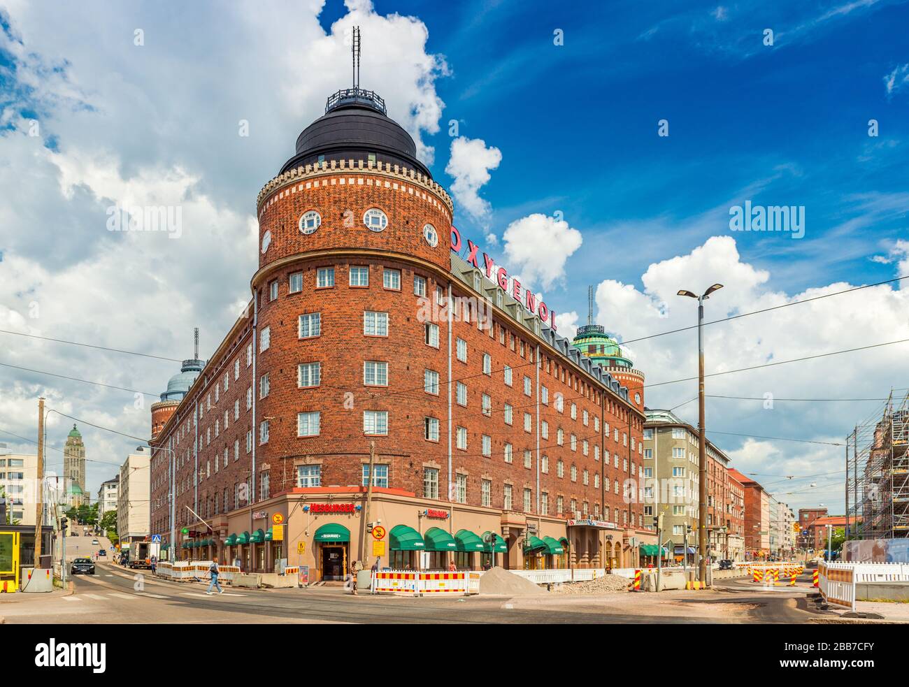 Helsinki - June 2019, Finland: View of a triangle building built of red ...