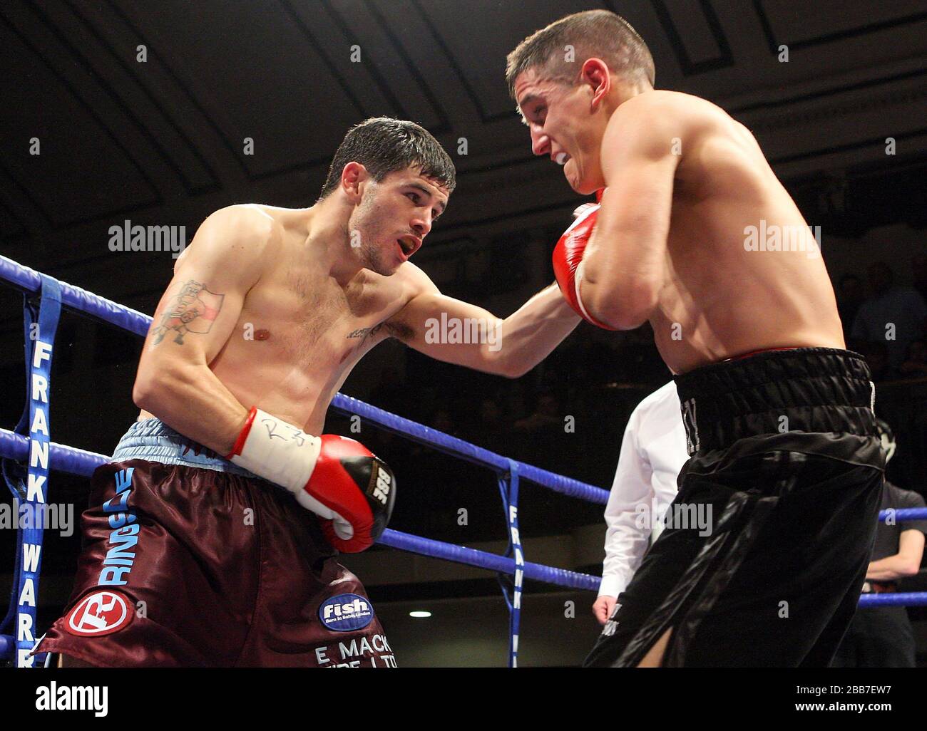 Matthew Marsh (claret/blue shorts) defeats Rocky Dean (Thetford, black ...