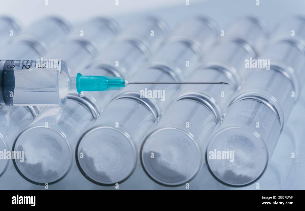 Medicine, Injection, vaccine and disposable syringe, drug concept ...