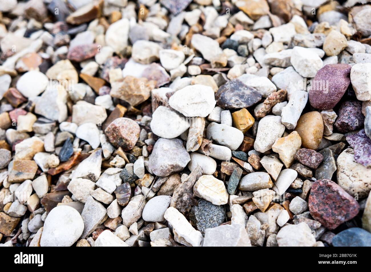 texture of many small stones of different colors, crushed stone, for ...
