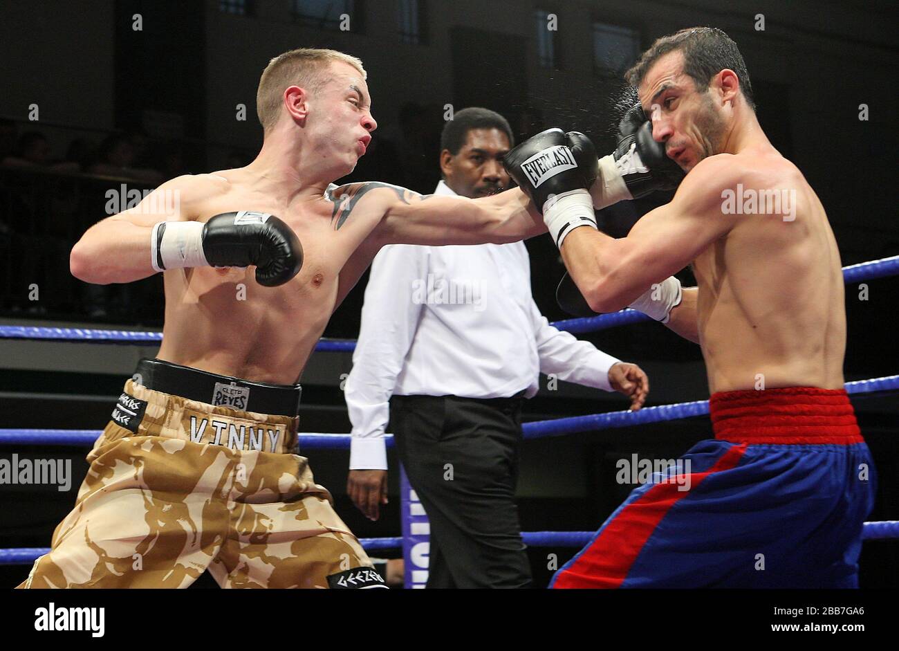 Vinny Mitchell (Dagenham, camouflage shorts) defeats Youssef Al Hamidi (Dewsbury, blue/red ...