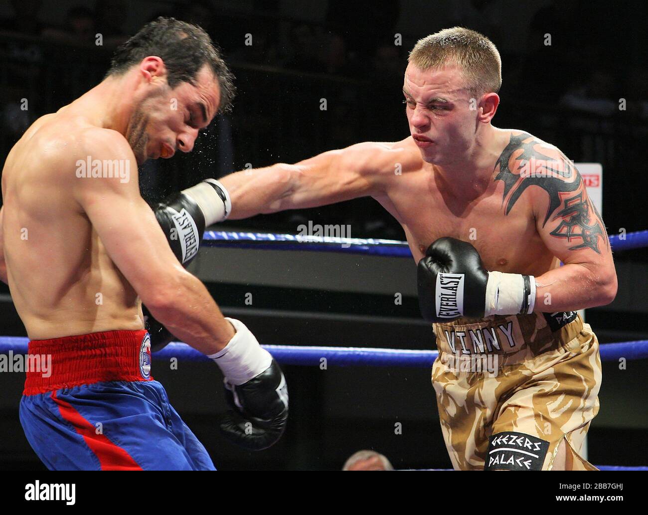 Vinny Mitchell (Dagenham, camouflage shorts) defeats Youssef Al Hamidi (Dewsbury, blue/red ...