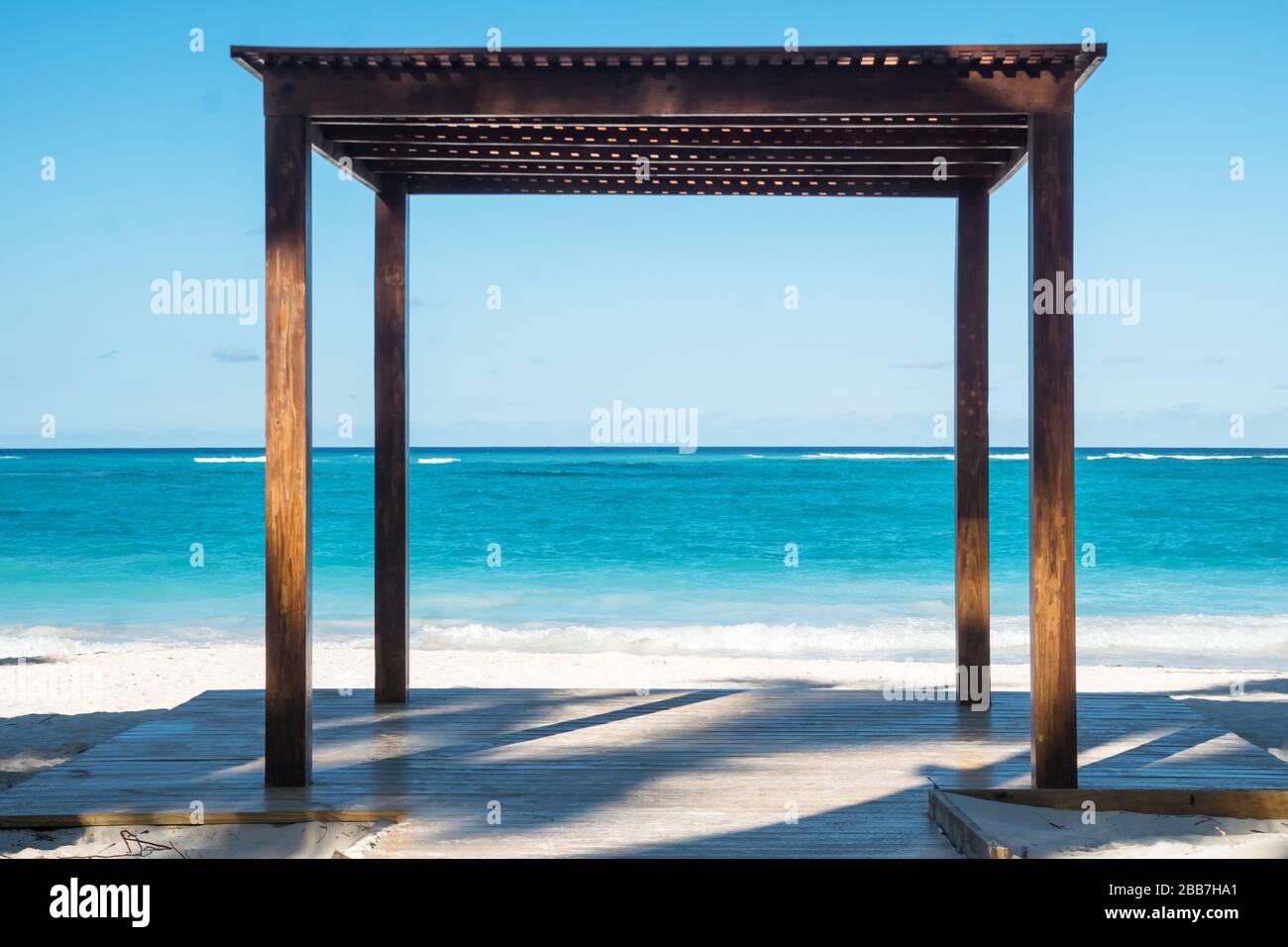 Beautiful wooden gazebo on the beach by the ocean Stock Photo - Alamy