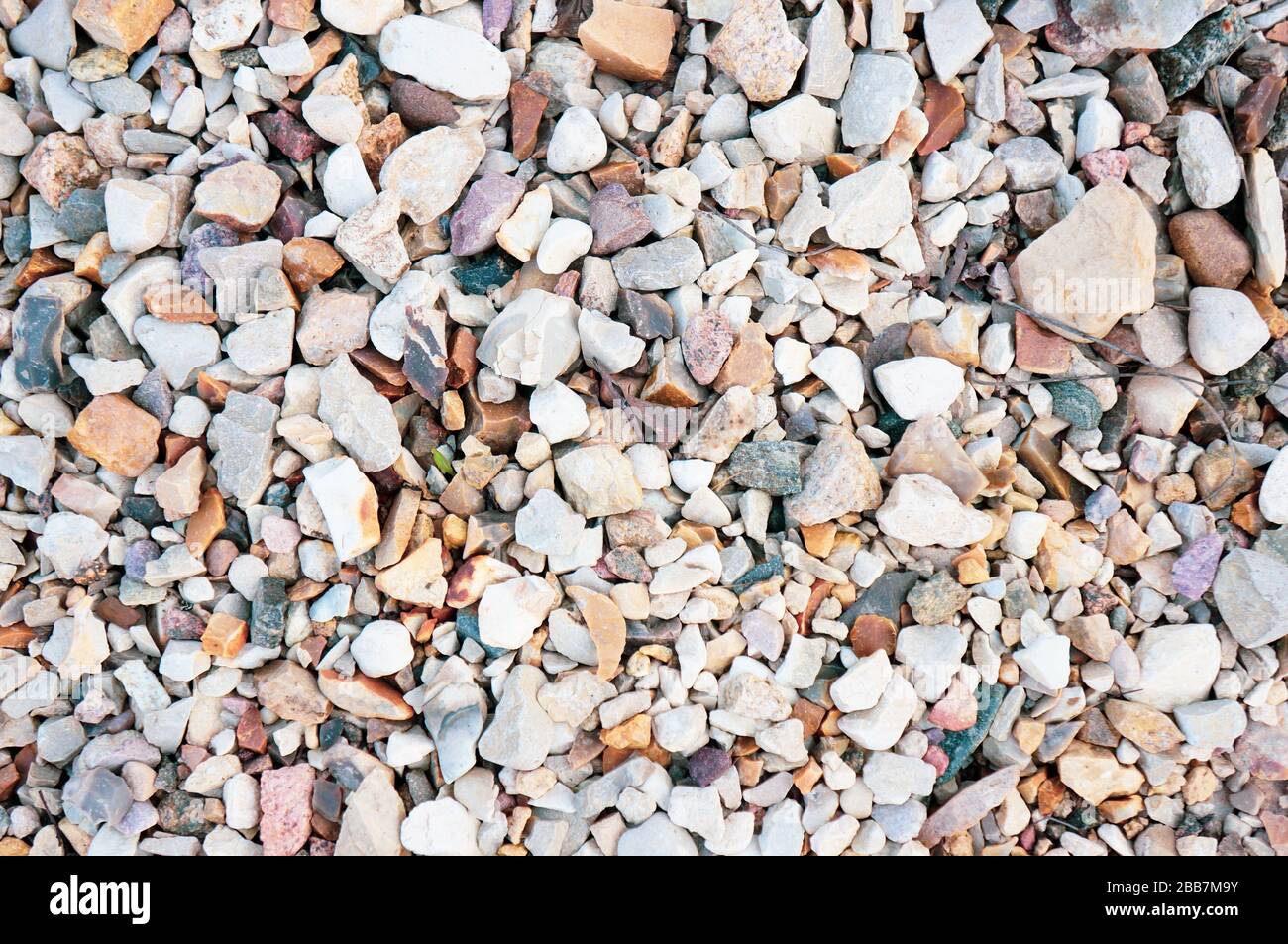 texture of many small stones of different colors, crushed stone, for ...