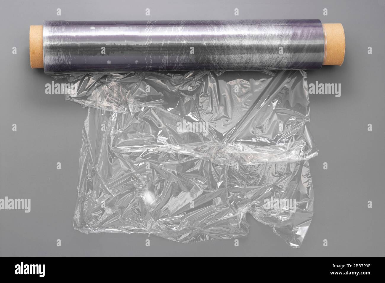 Wrapping plastic stretch film roll, abstract plastic waste concept ...