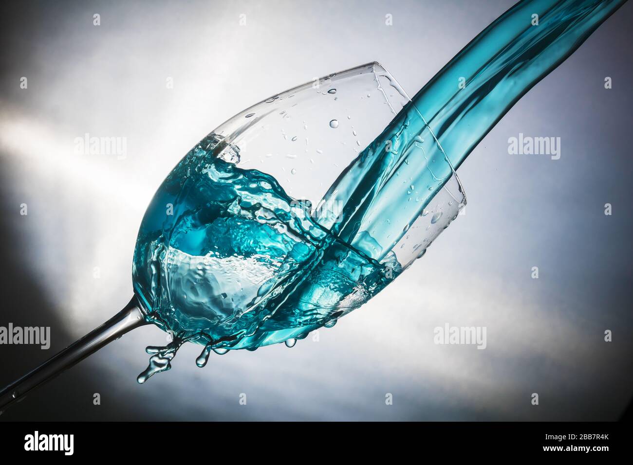 Beautiful spray colored water in a glass were photographed in the ...