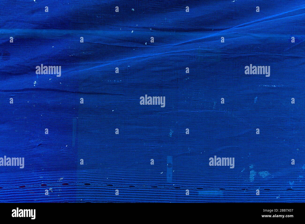 House construction redevelopment site suspended with blue dust ...