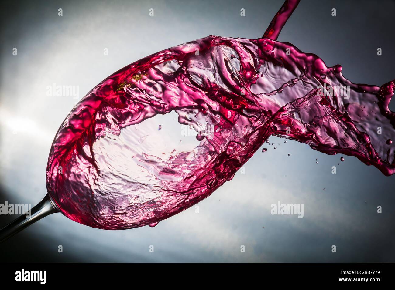 Beautiful spray colored water in a glass were photographed in the ...