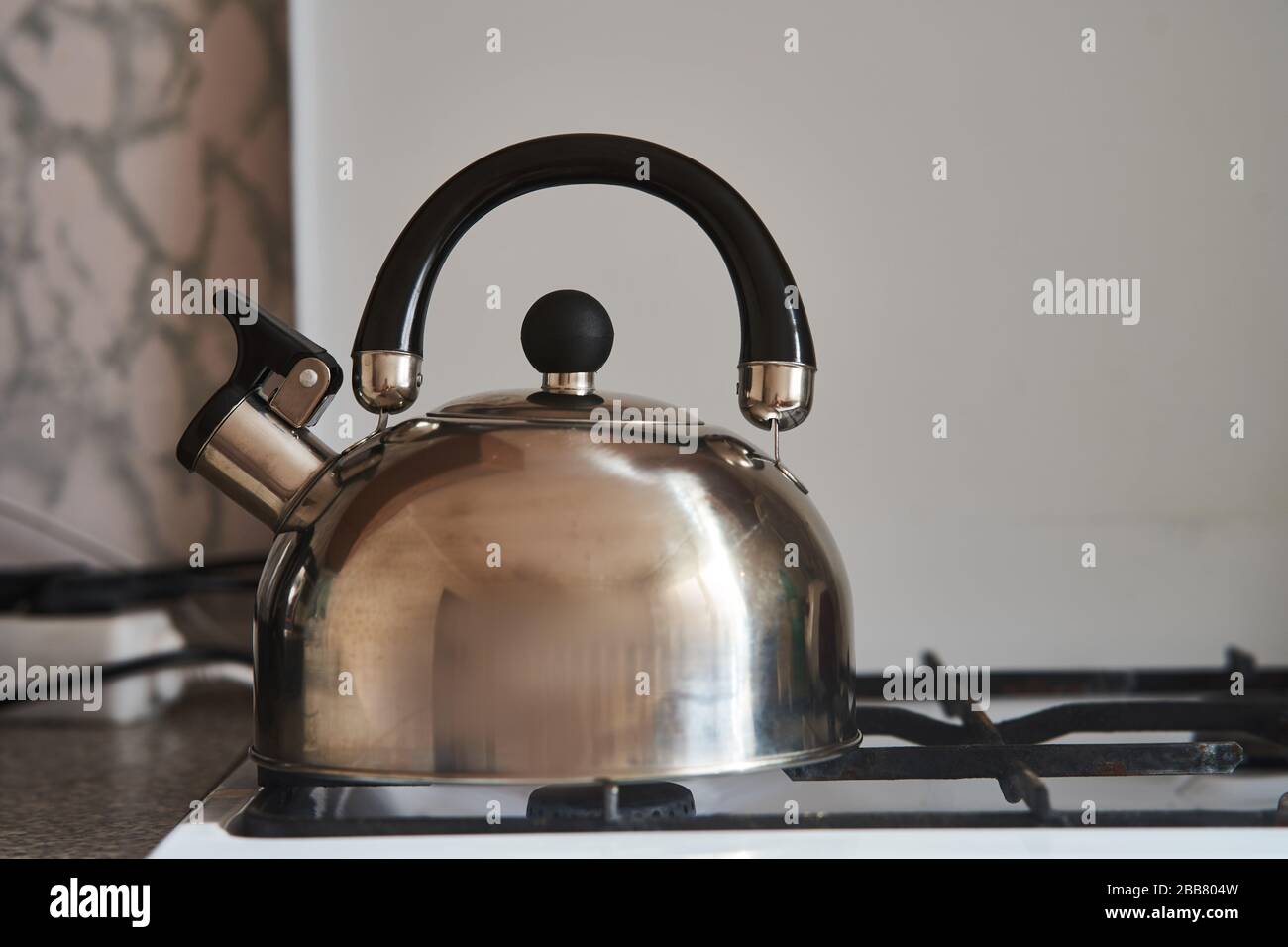 Kettle boiling on gas hi-res stock photography and images - Alamy