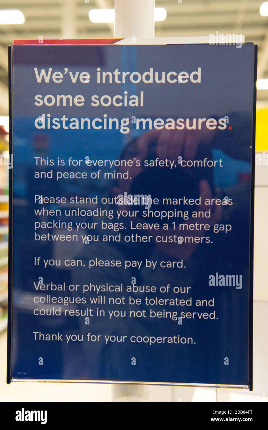 Tesco customer notice for social distancing hi-res stock photography ...