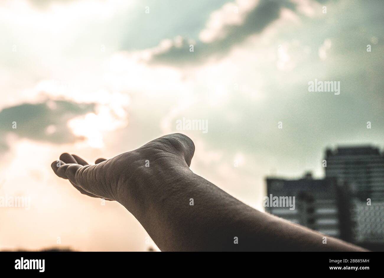 Hand reaching into the sky. Hand Reaching the Sky, connection, earth ...