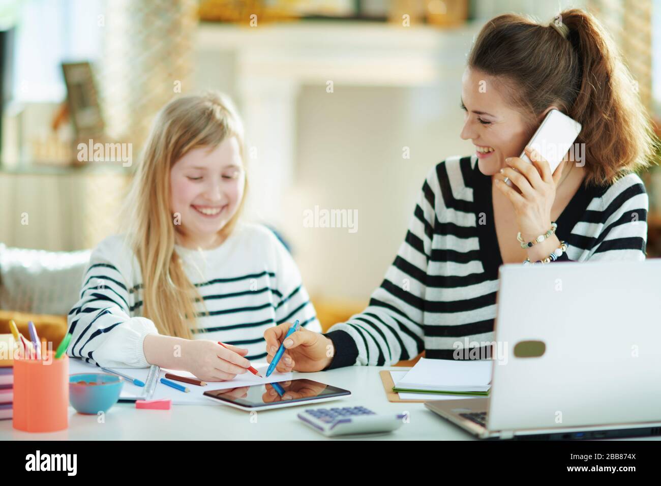 Speaking home mother hi-res stock photography and images - Alamy