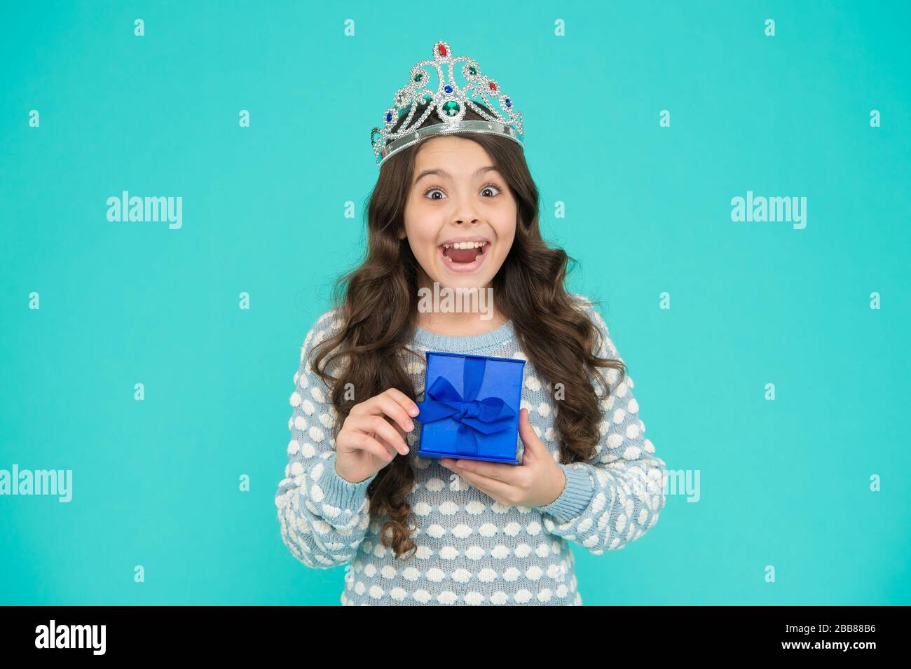 Happy childhood. Focus on beauty. Girl wear crown. Princess manners ...