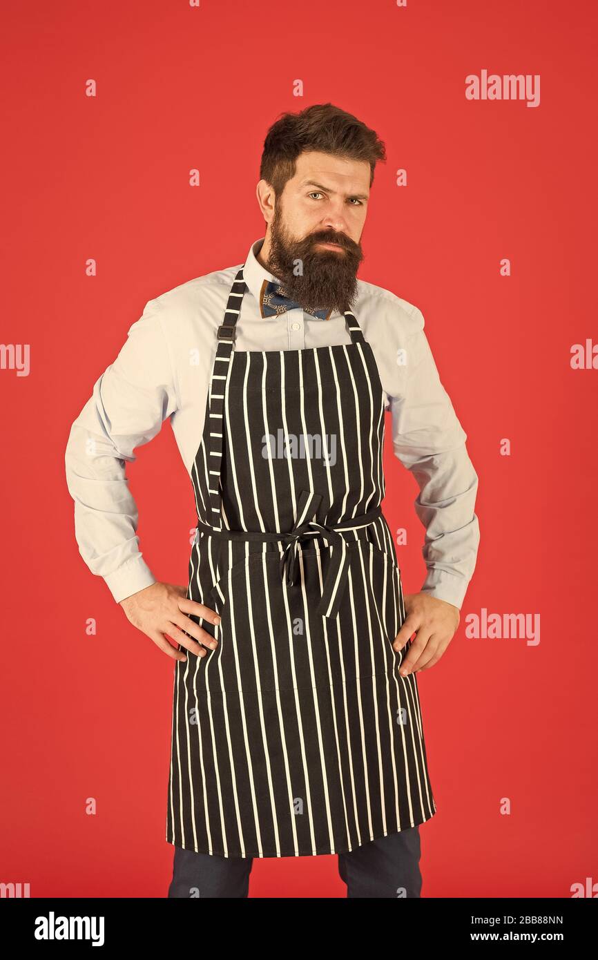 male cooking. bearded man in chef apron. brutal waiter on kitchen ...