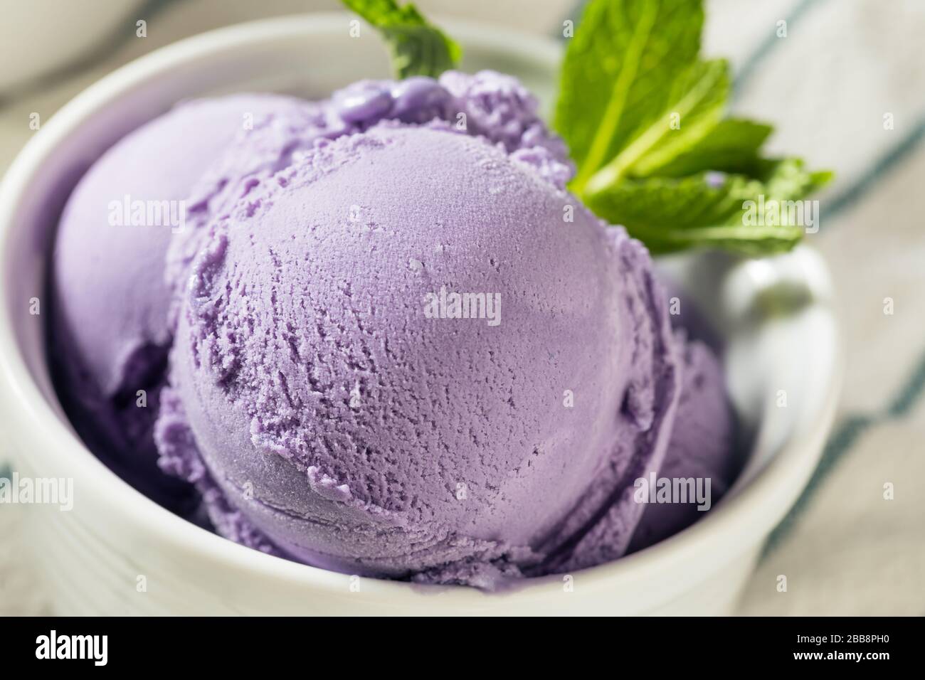 Homemade Purple Japanese Ube Ice Cream in a Bowl Stock Photo - Alamy