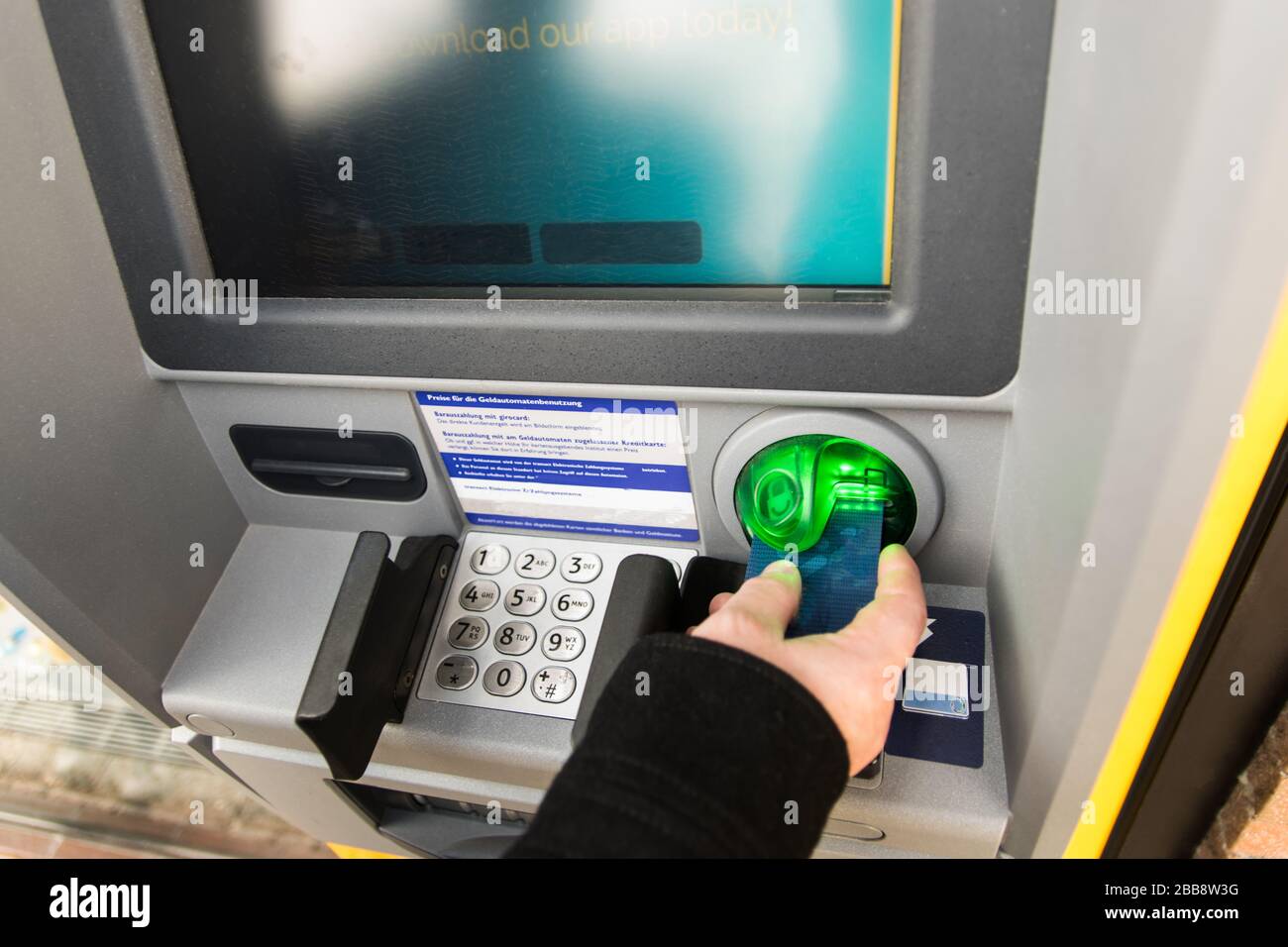 Man inserts card cash dispenser hi-res stock photography and images - Alamy