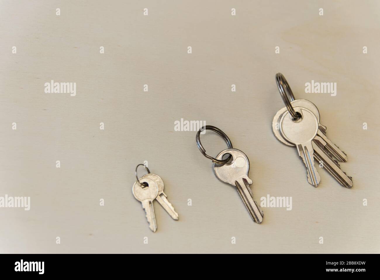 Three iron keys on the wood background. Copy space. Flat lay Stock ...