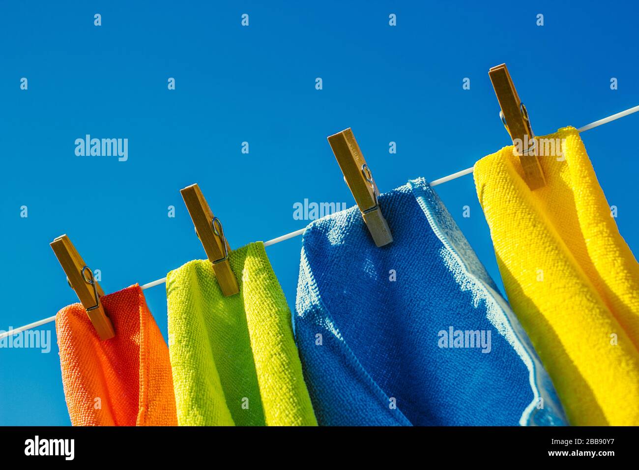 Colourful Clothes drying on the line Stock Photo - Alamy