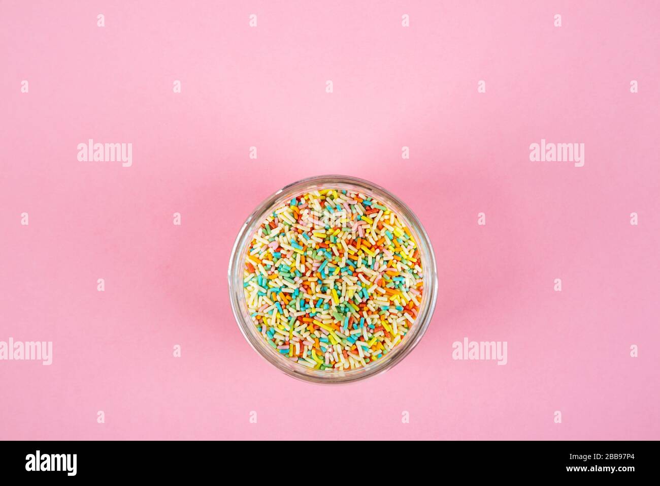 pot with colored sugar sticks for confectionery Stock Photo - Alamy