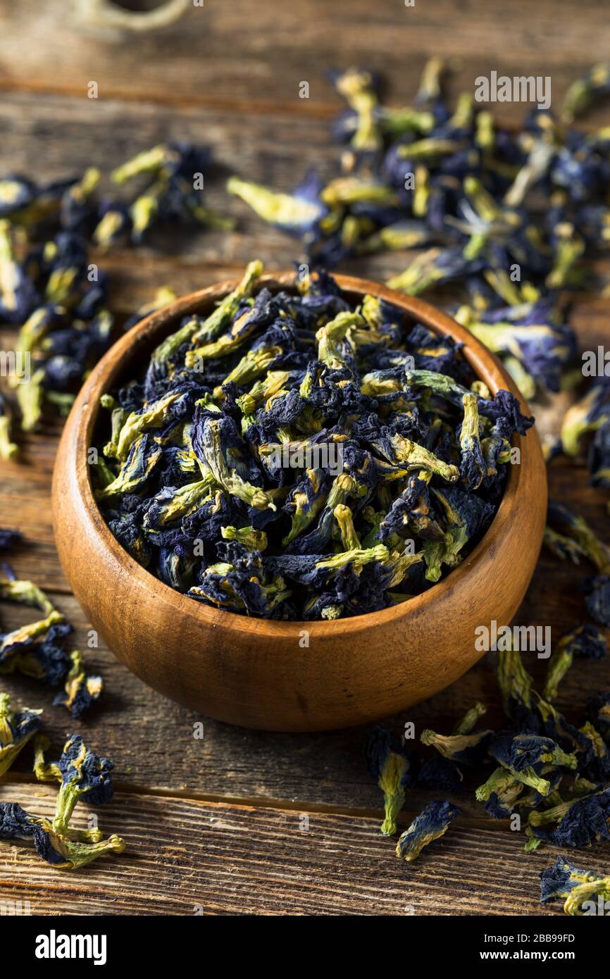 Dried Organic Butterfly Pea Flowers in a Bowl Stock Photo - Alamy