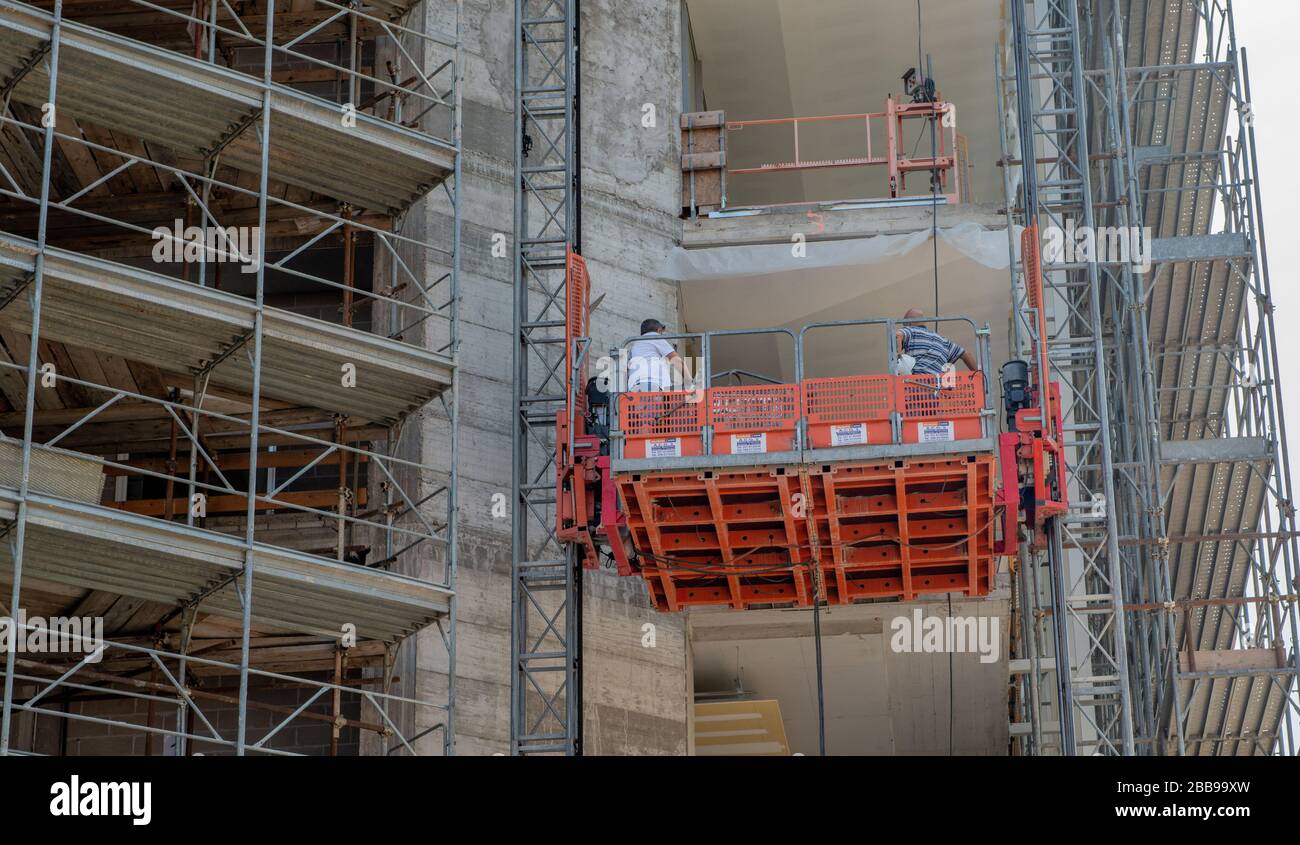 Milan Italy 29 June 2019 workers while working safely for electrical ...