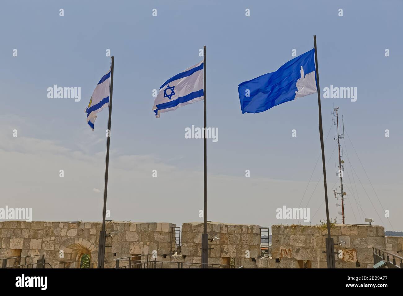 The Tower of David Museum flag, the Israeli flag and the Jerusalem city ...