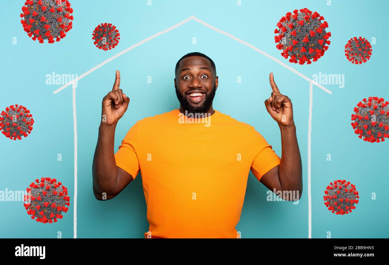 Concept of stay at home message with a man inside his house and around ...