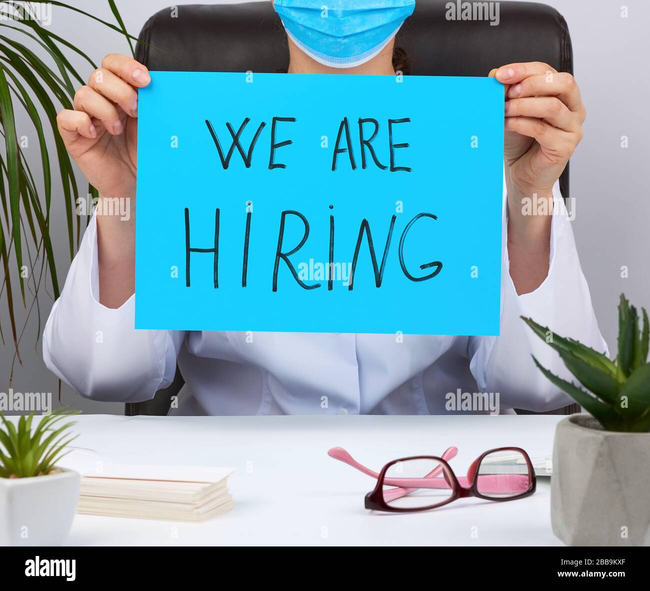 Female doctor hire sign hi-res stock photography and images - Alamy