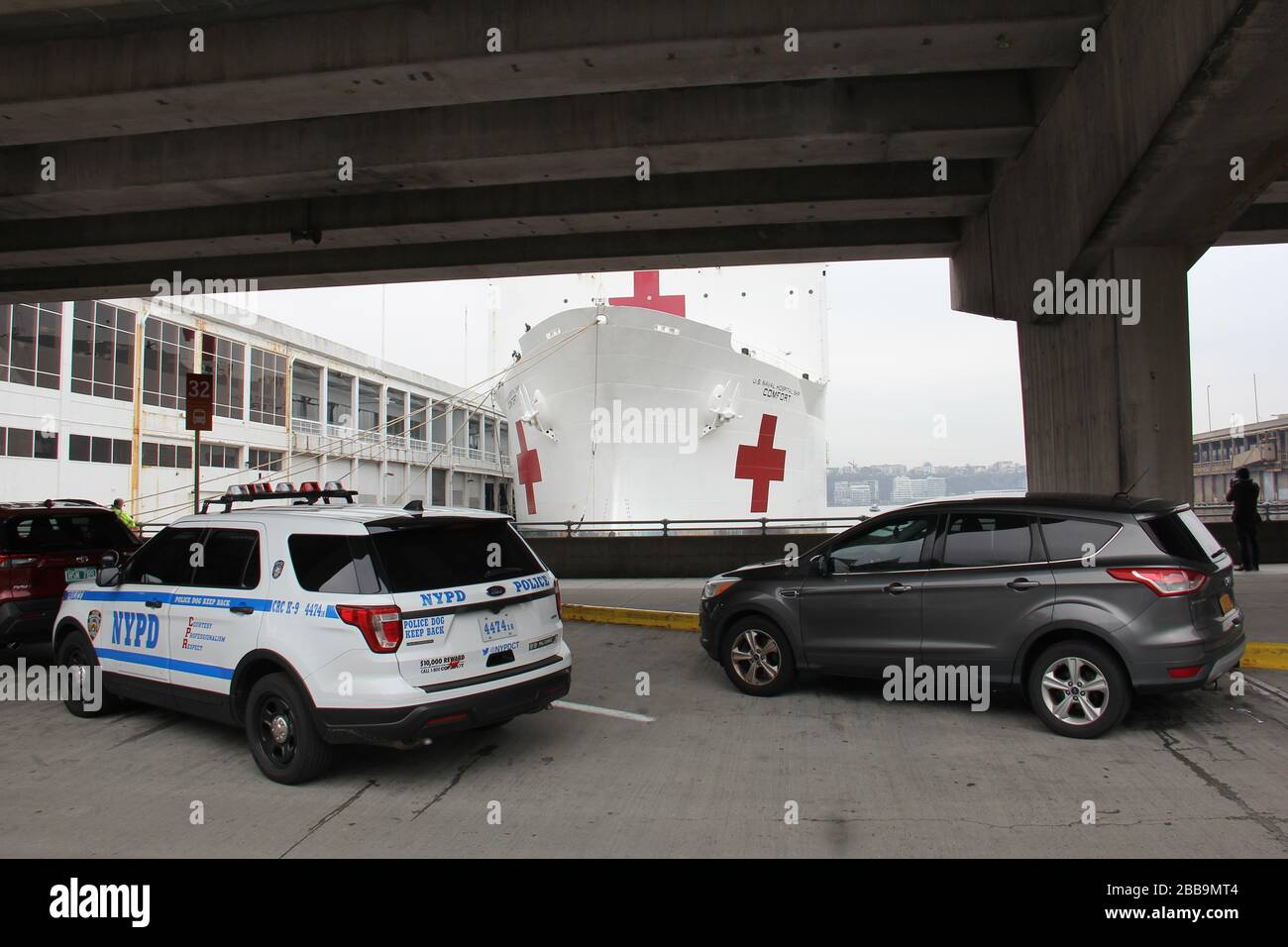Hospital ship USNS COMFORT docked at Pier 90, upon arrival to NYC ...