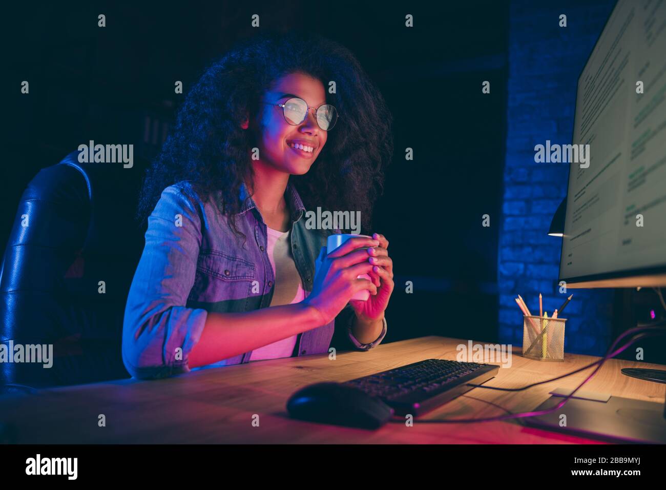 Profile photo of beautiful dark skin business lady look screen monitor ...