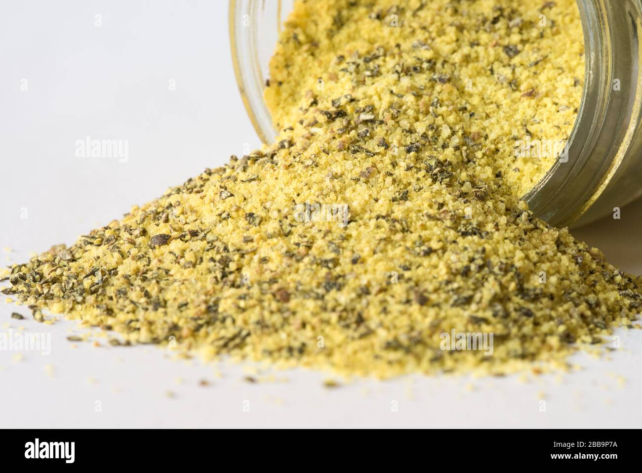Lemon Pepper Spilled from a Spice Jar Stock Photo - Alamy