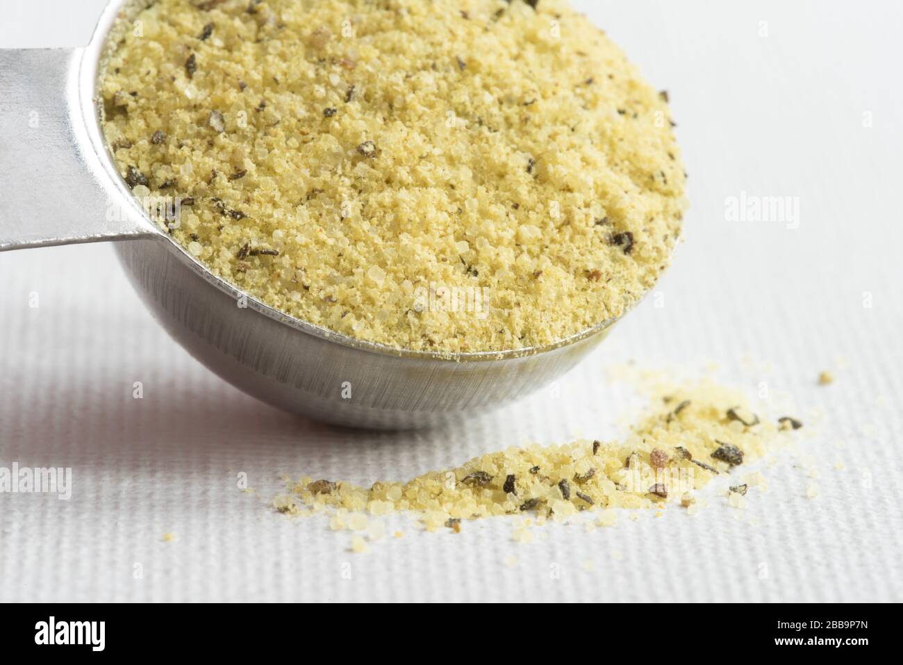 Lemon Pepper Spilled from a Teaspoon Stock Photo - Alamy