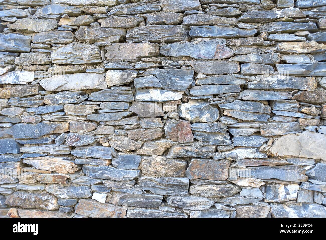 View of the stone wall texture - Ligurian typology Stock Photo - Alamy