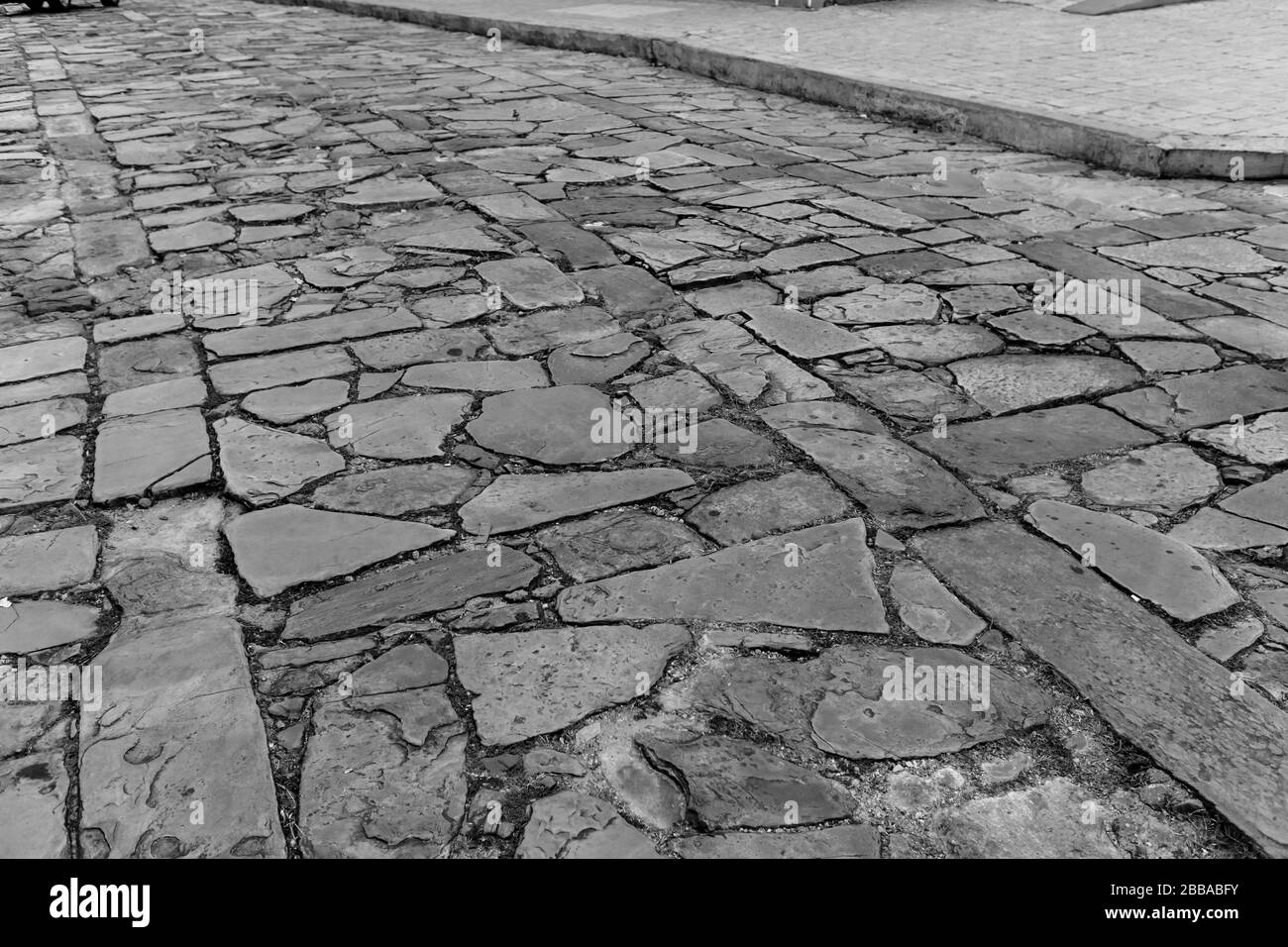 Ancient street made of stone, from the colonial period, in the historic ...