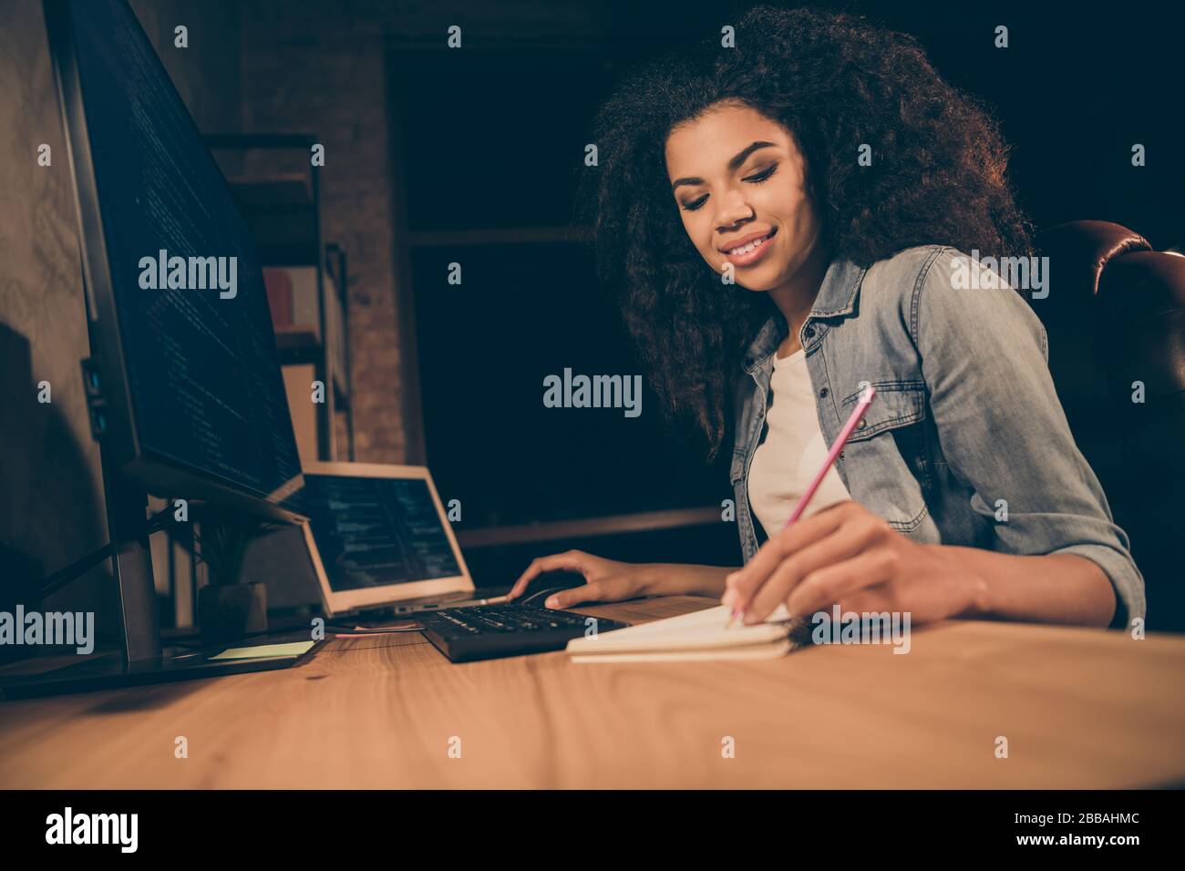 Smart skilled afro american girl professional engineer sit evening desk ...