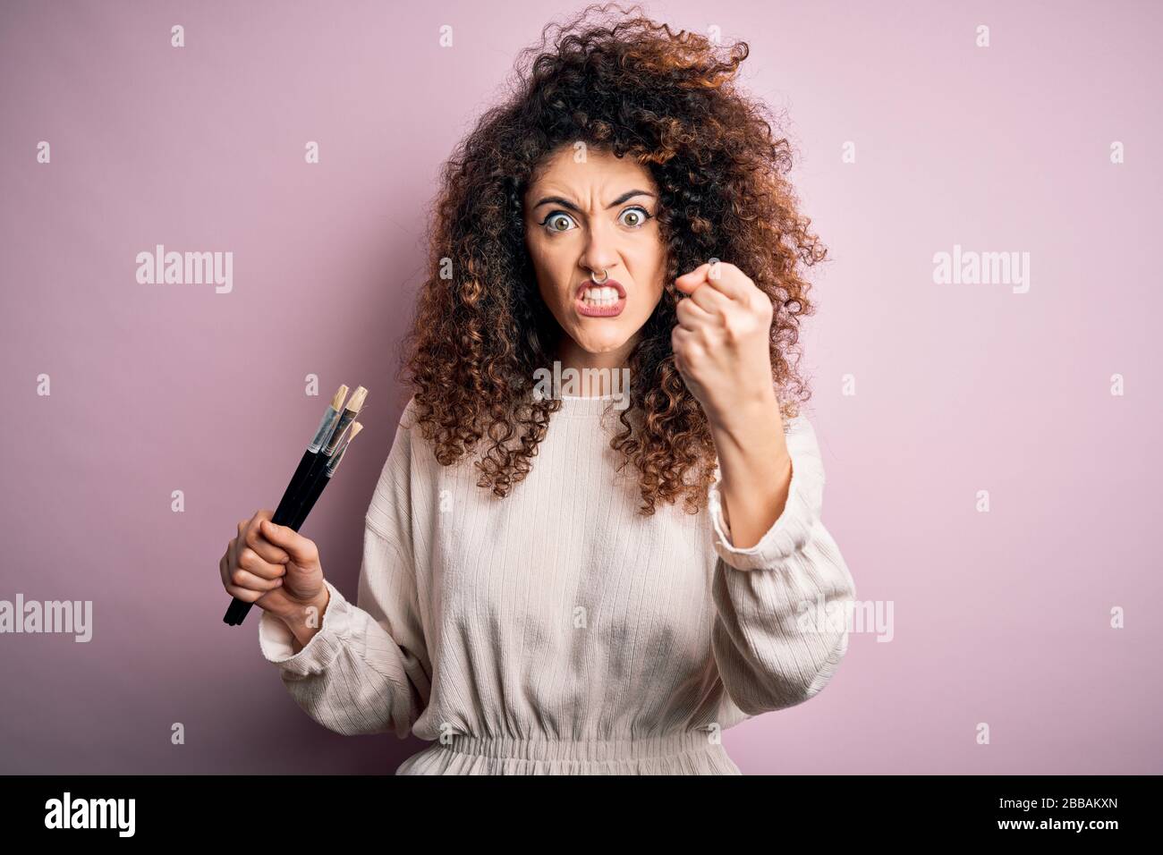Applying makeup angry hi-res stock photography and images - Alamy