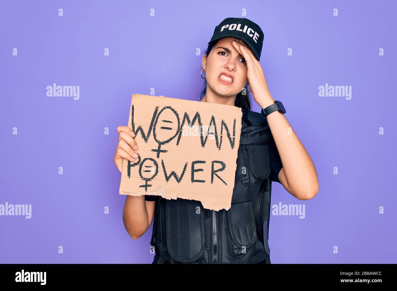 Police woman wearing security bulletproof vest uniform holding woman ...