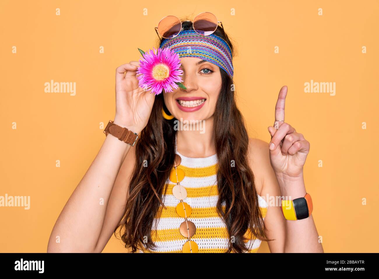 Woman flower over one eye hi-res stock photography and images - Alamy