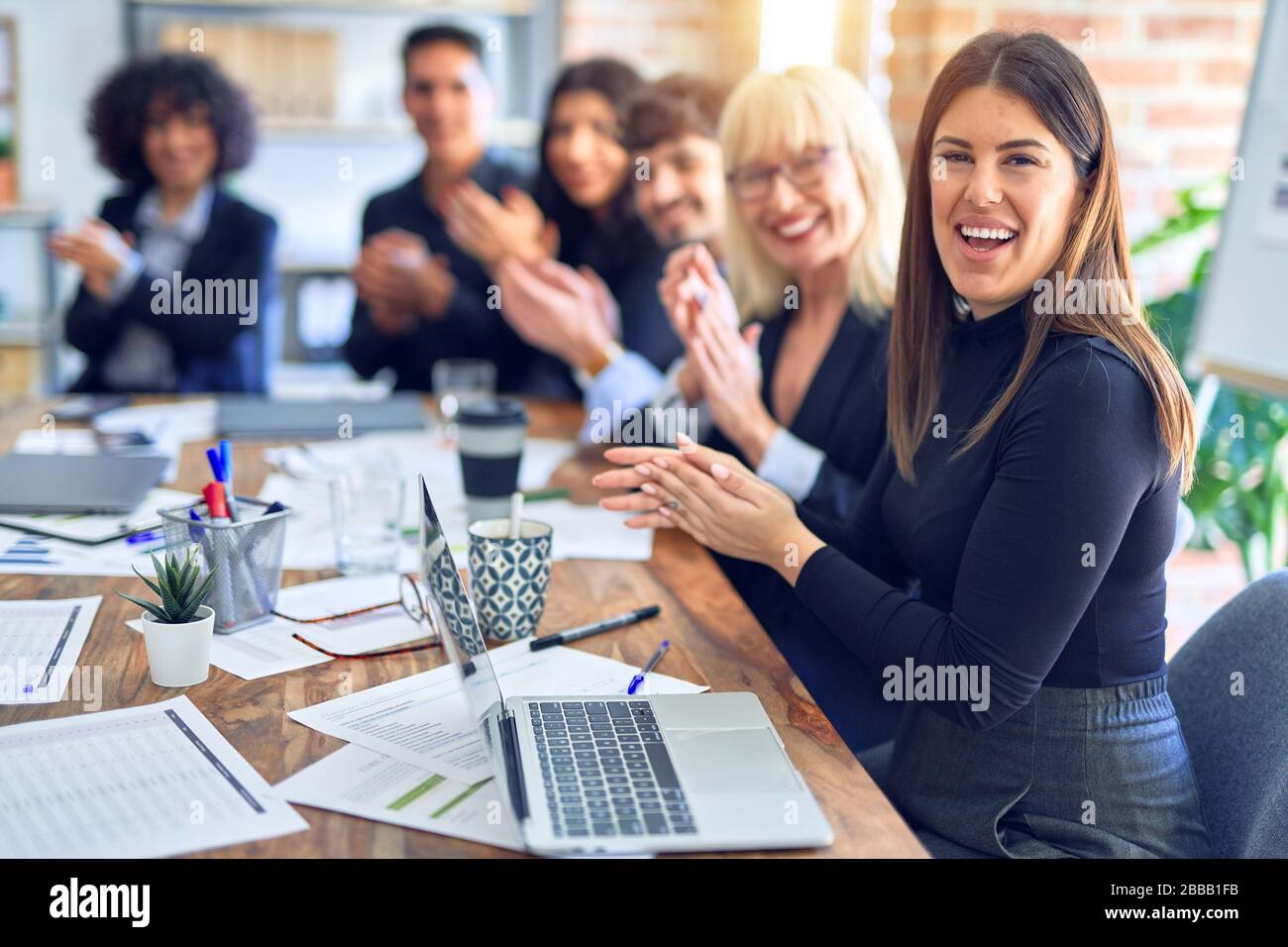 Group of business workers smiling happy and confident. Working together ...