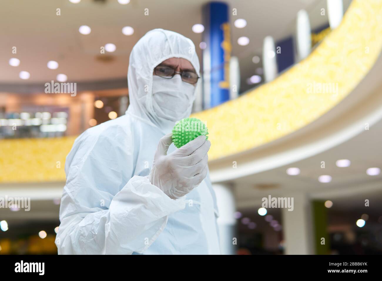 man in coverall disposable anti-epidemic antibacterial isolation suit ...