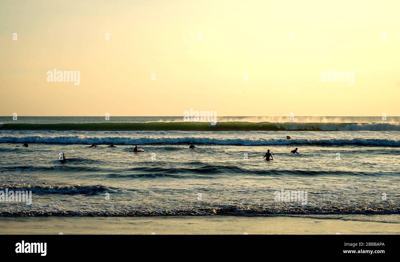 View of the sunset on the beach Stock Photo - Alamy