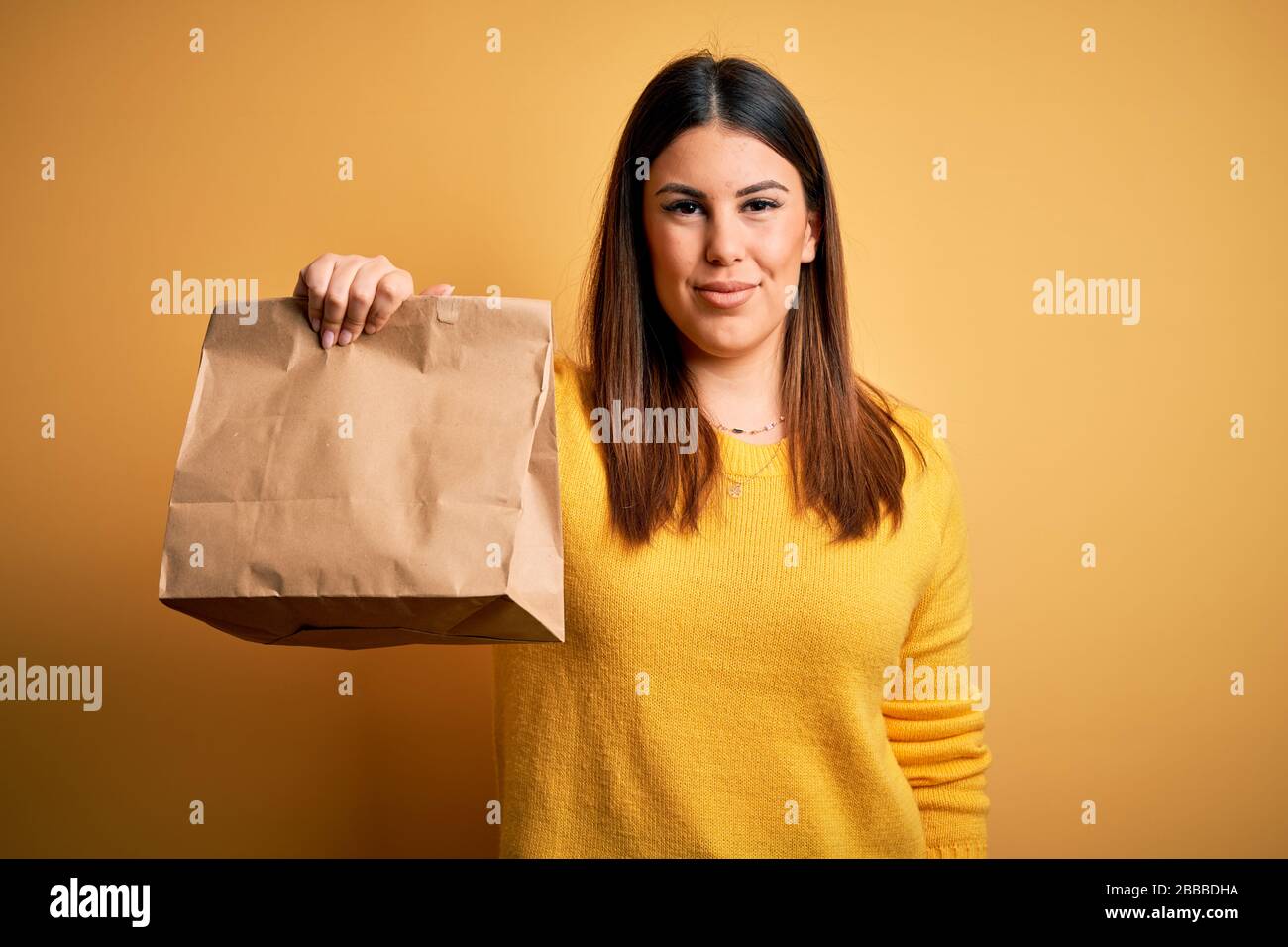 Beautiful female courier look hi-res stock photography and images - Alamy