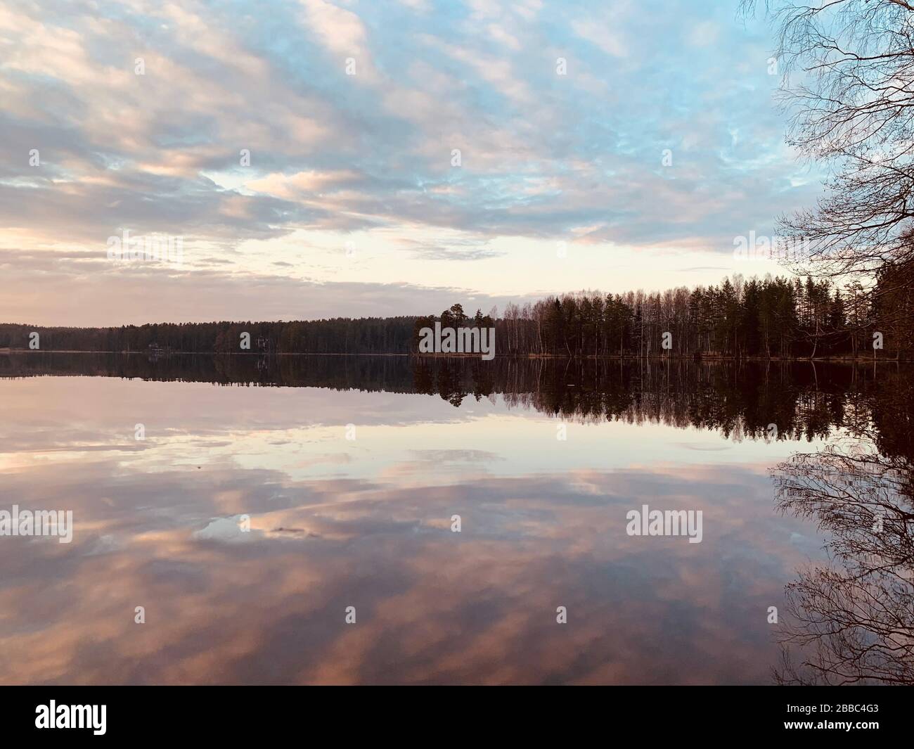 The coast at sunset, the picturesque sunset, quiet water, Mirror in ...