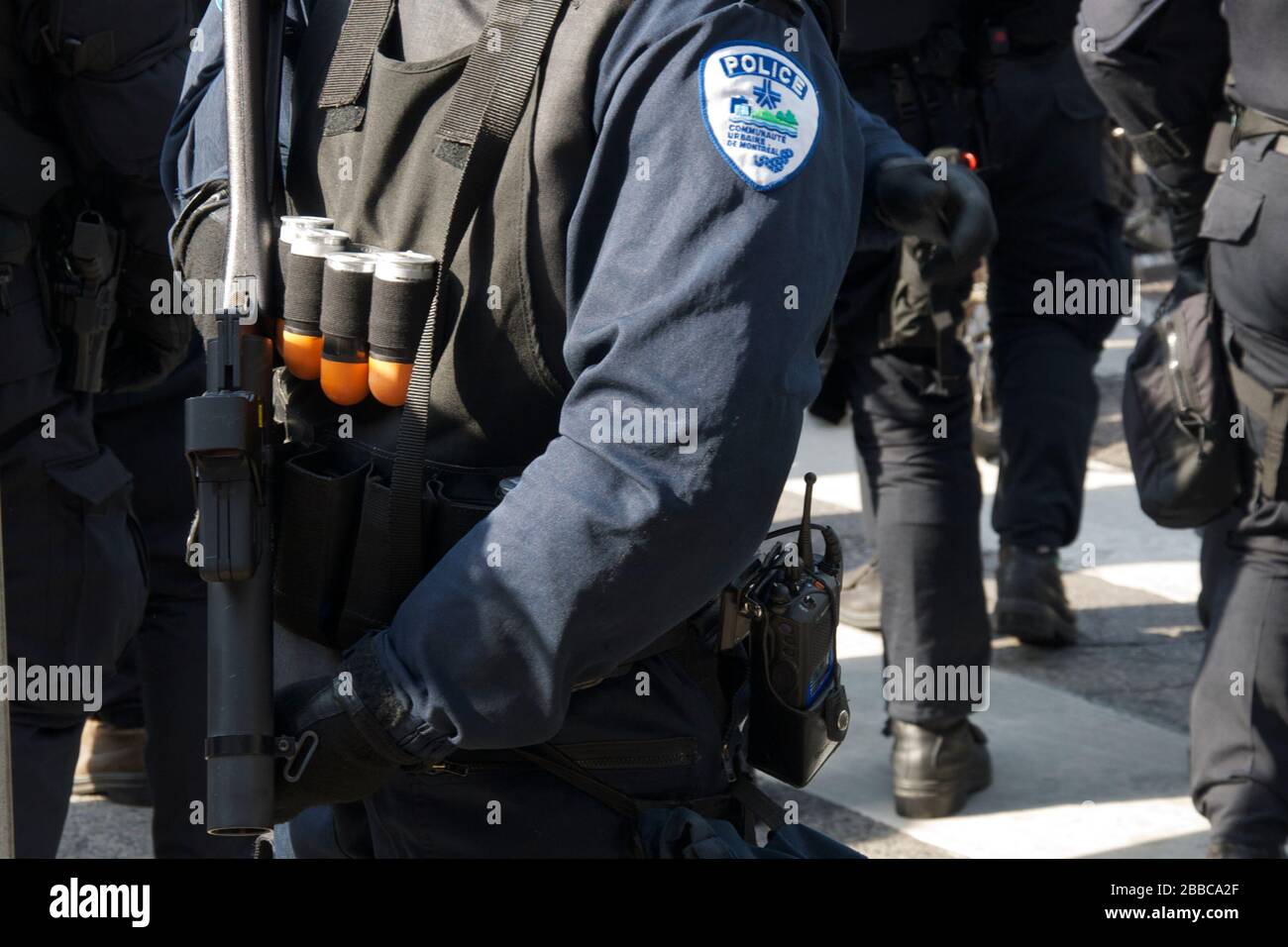 Riot police in full gear to control thousands of activists marching ...