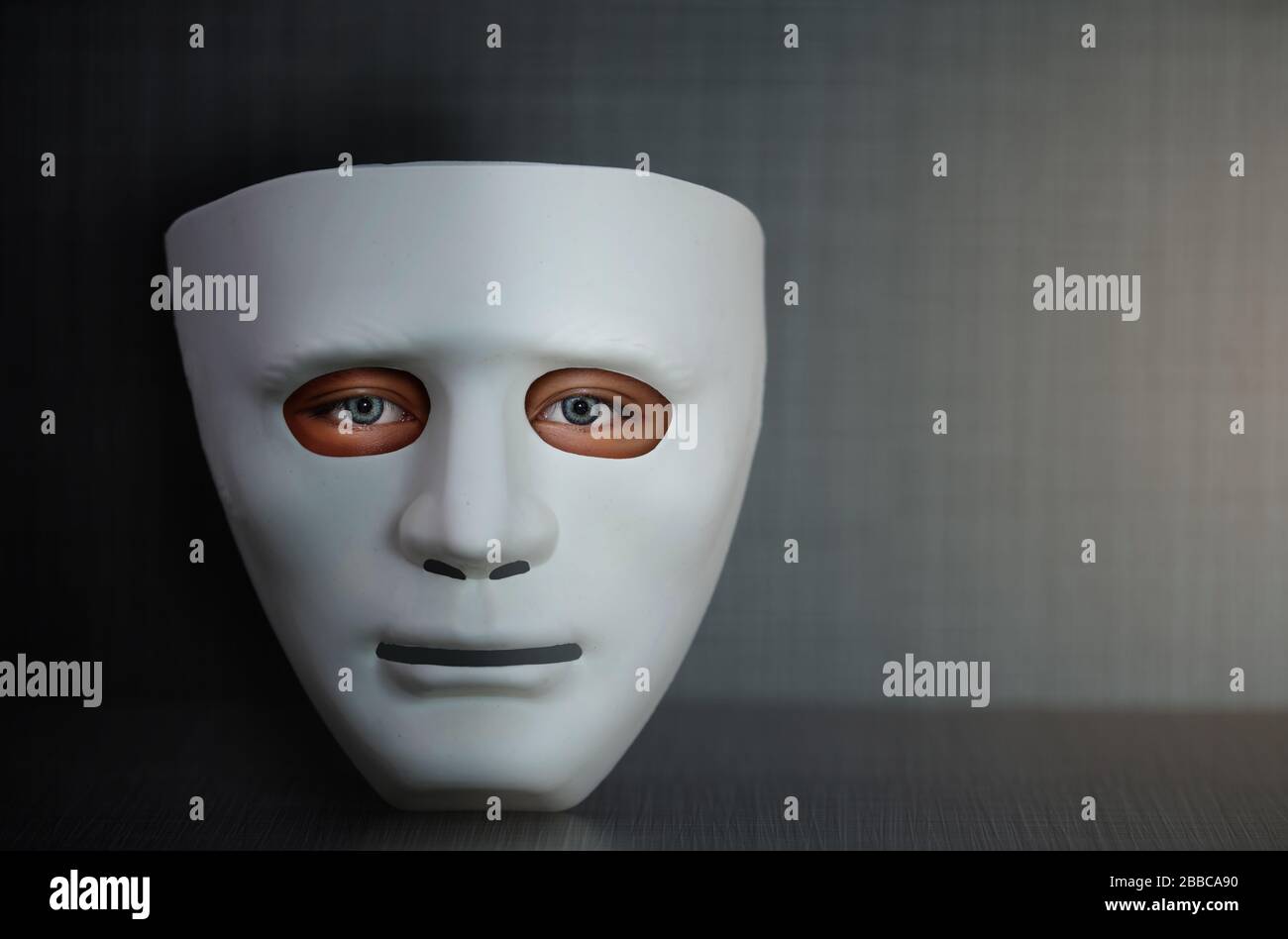 white plastic face mask with human eye Stock Photo - Alamy