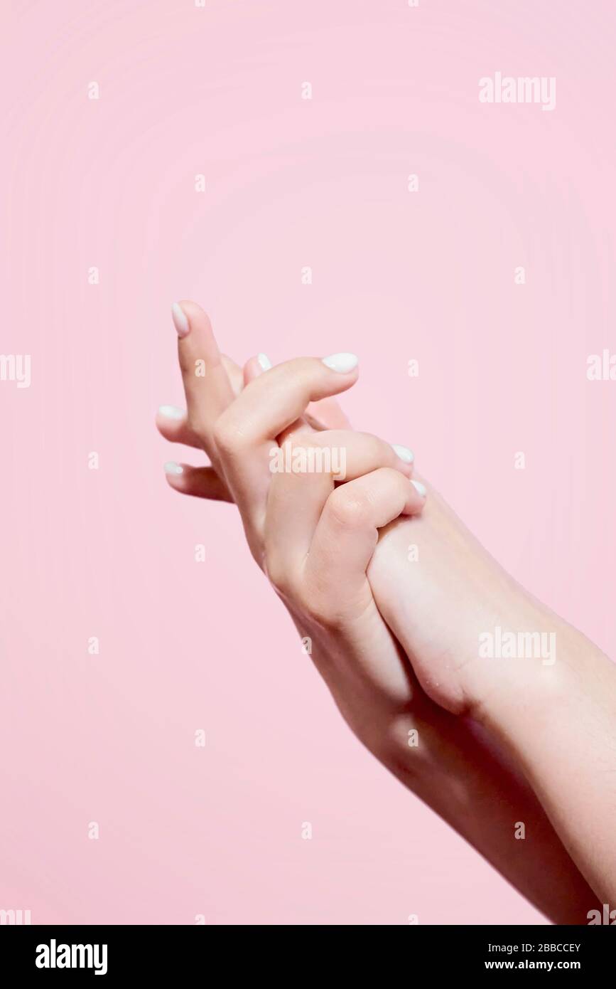 An unrecognizable woman arms. Woman showing hands with beautiful light ...