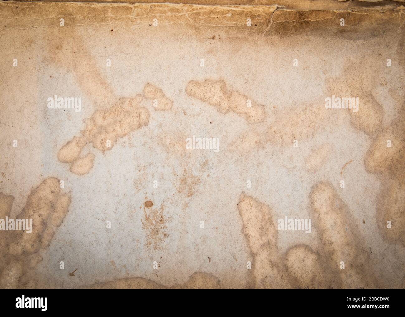 Old and dirty paper background. Humidity and water effects. Free space ...