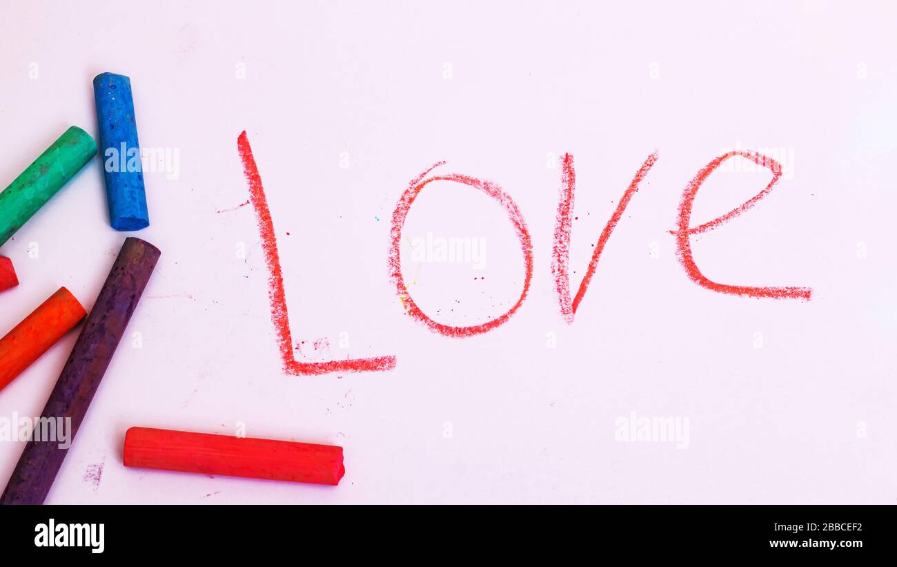 Rainbow colored word love hi-res stock photography and images - Alamy
