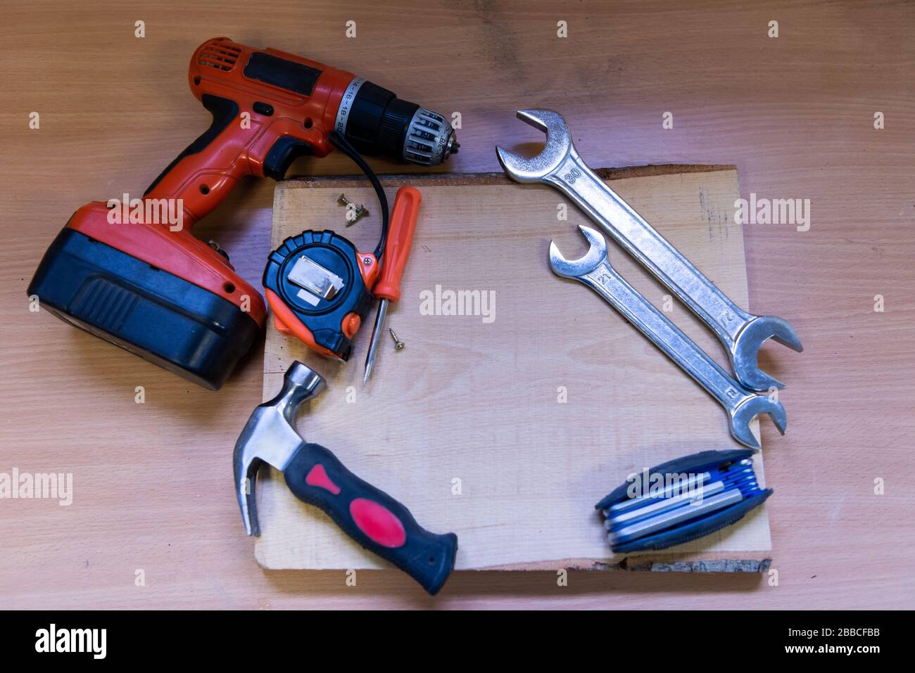 set of hand working tools on wooden background The concept of tools and ...